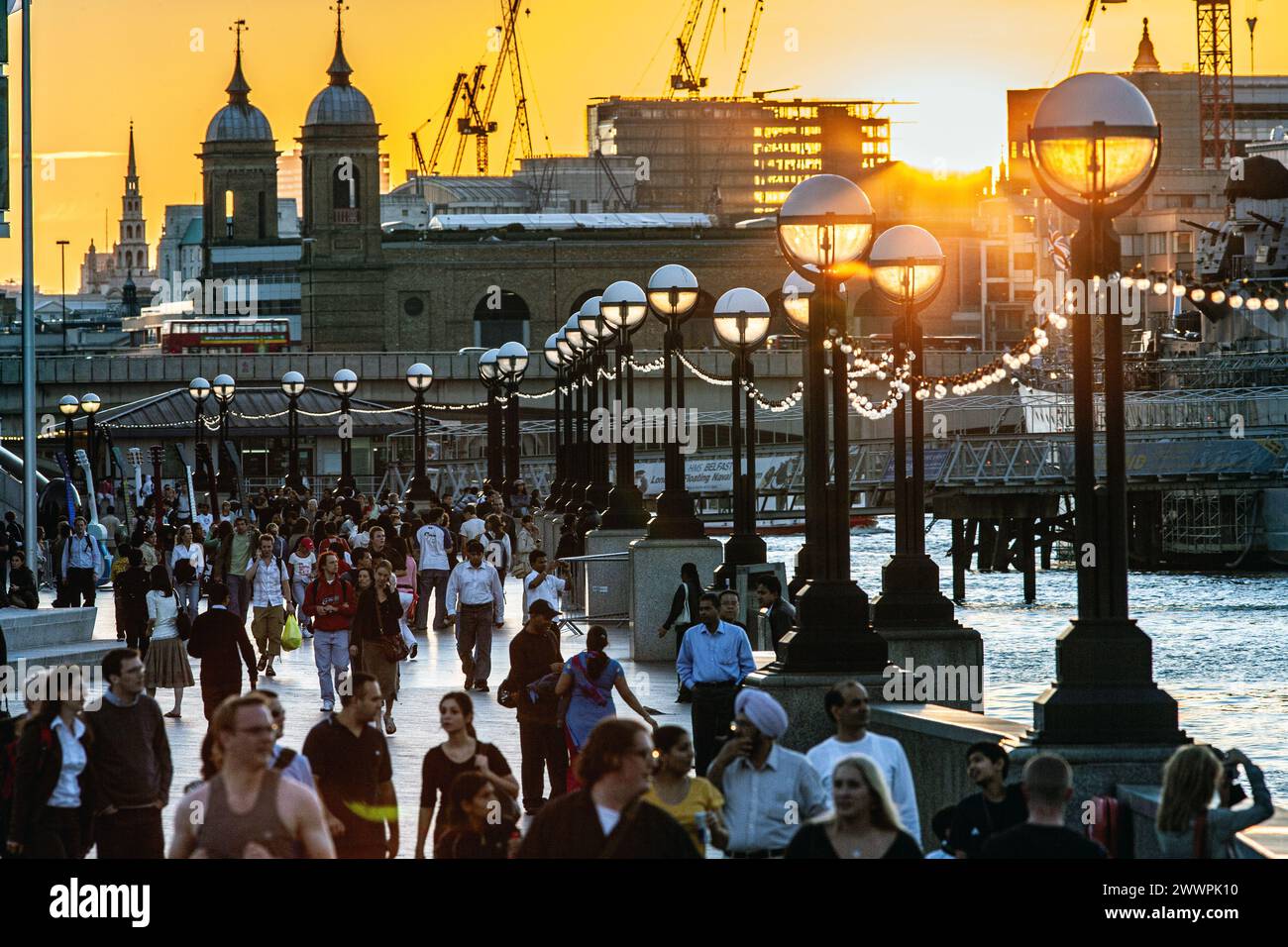 South Bank, London, England, UK - People walking along the River Thames ...