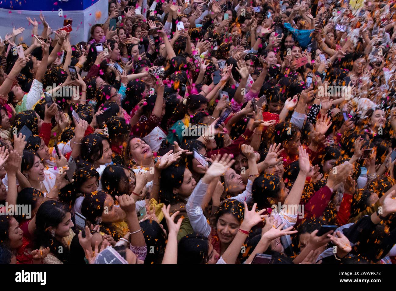 On March 25, 2024, in Kathmandu, Nepal. Woman devotees are flinged with ...