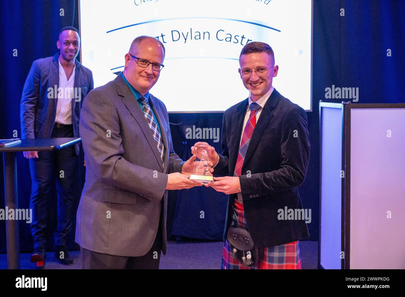 Senior Airman Dylan Castro receives the Chief Master Sergeant Paul H ...
