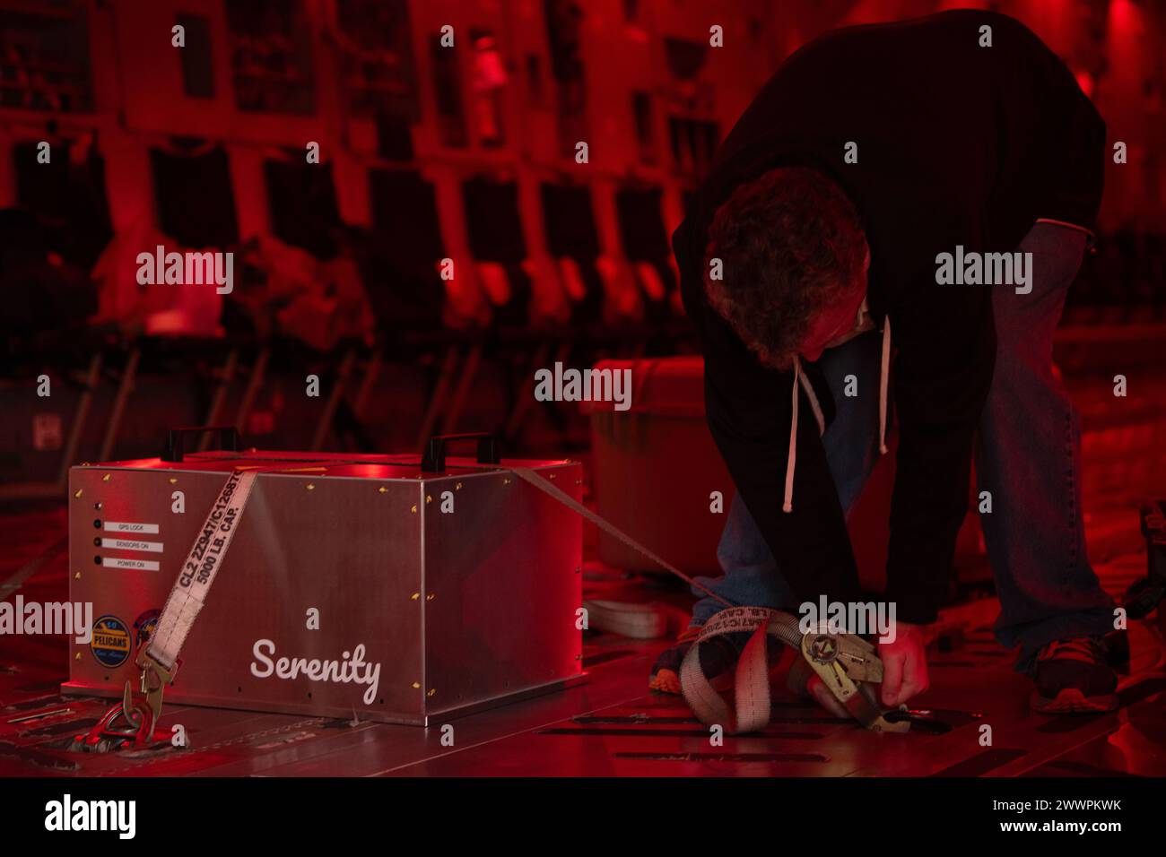 Mr. Eric Shoup, SandboxAQ software engineer, sets up a quantum sensor ...