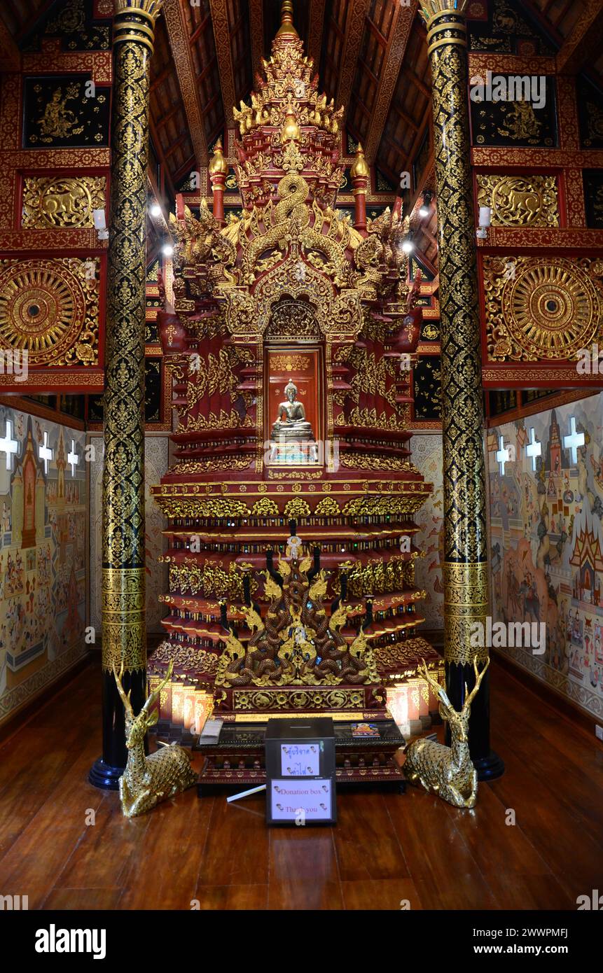 Ancient Phra Sing buddha statue in antique ubosot of Wat Phra Singh ...