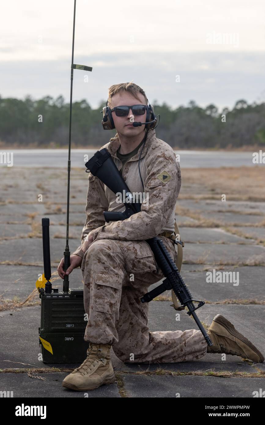 U.S. Marine Corps Cpl. Liam Smith, airborne and air delivery specialist ...