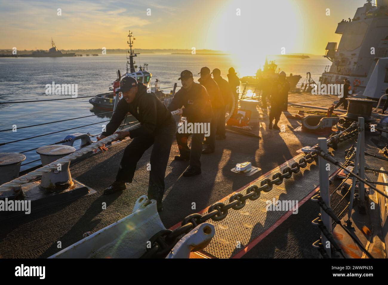 240202-N-JM579-1131 ROTA, Spain (Feb. 2, 2024) Sailors heave around ...