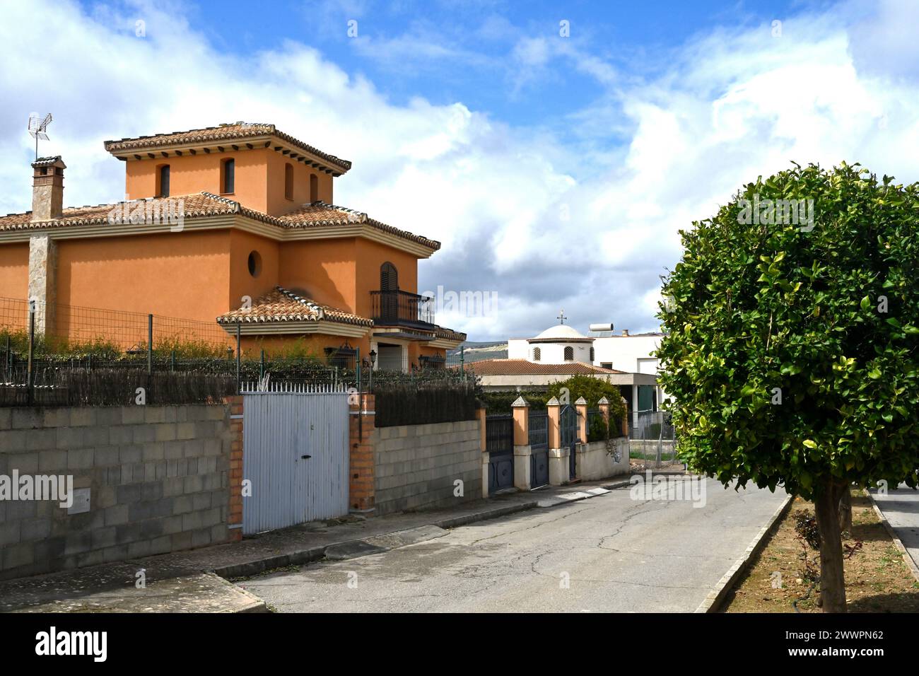 Street in Huétor Tájar, Granada, Spain with houses in local southern ...