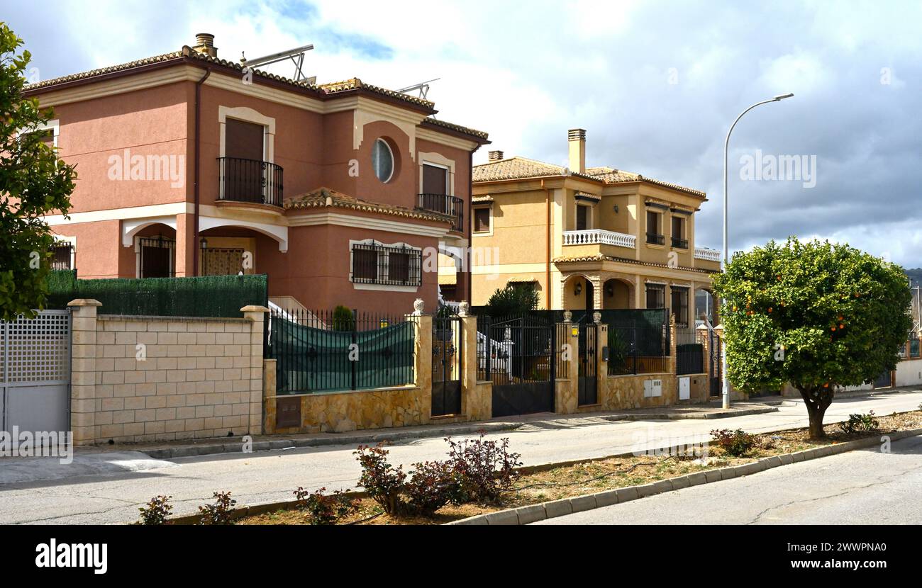 Street in Huétor Tájar, Granada, Spain with houses in local southern ...