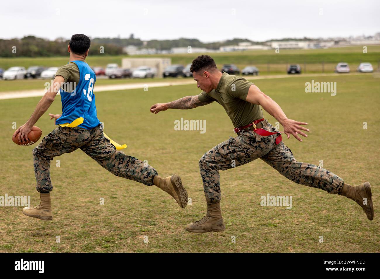 U.S. Marines with Marine Air Control Group (MACG) 18 play flag football ...