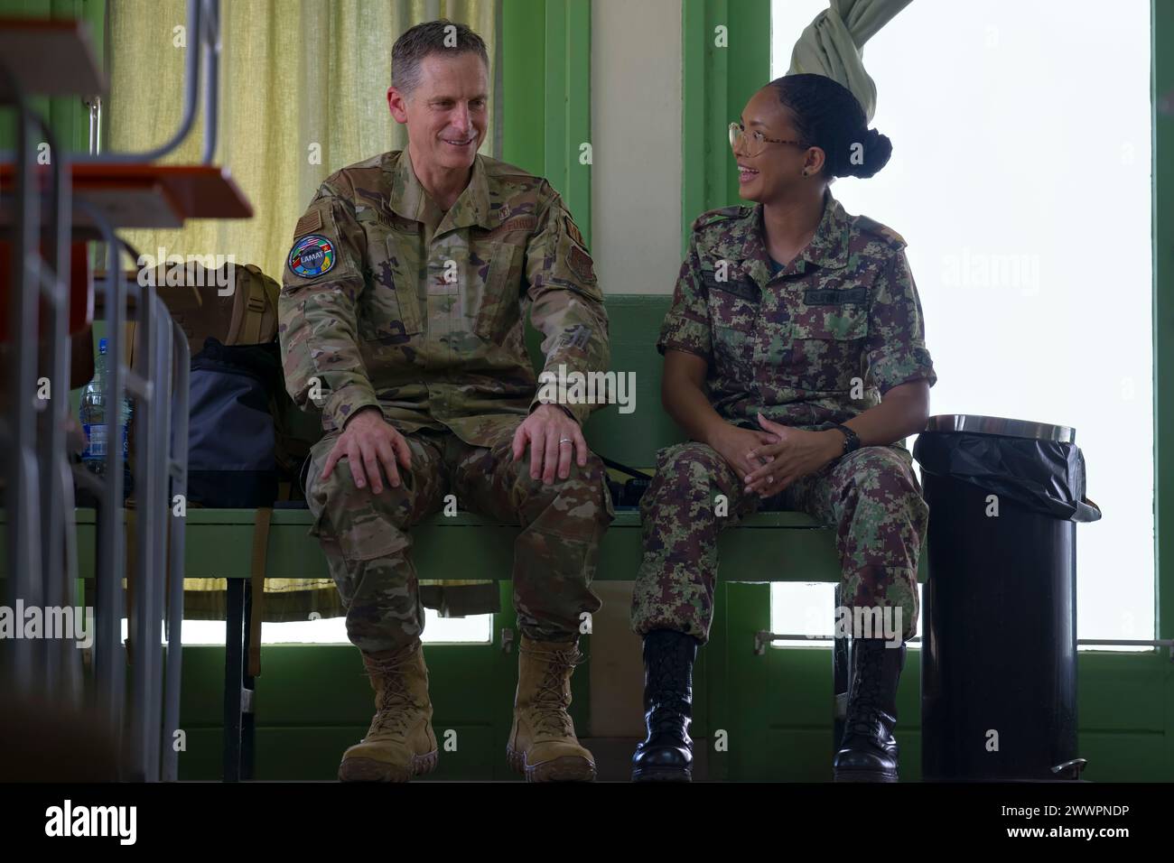 U.S. Air Force Col. Robert Noll, troop commander, sits with Suriname ...