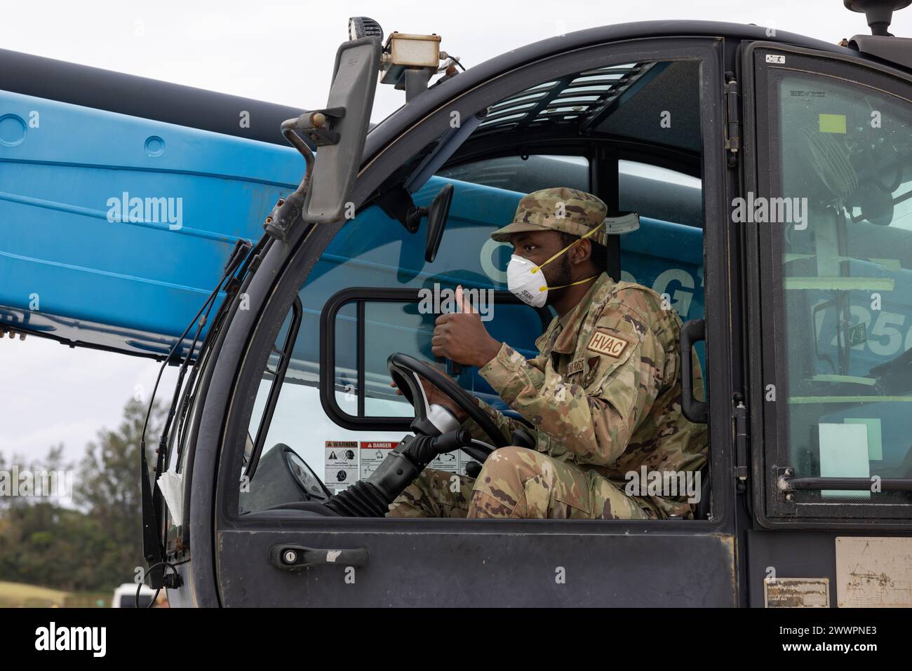 U.S. Air Force Airman 1st Class Kenith Lawrence, a heating ventilation ...