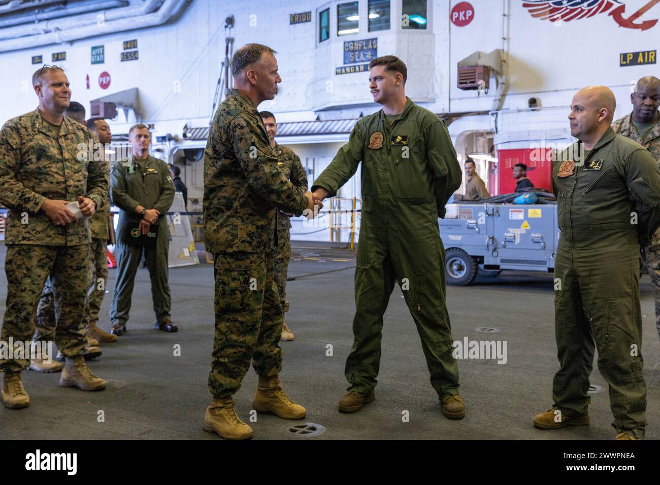 U.S. Marine Corps Maj. Gen. Eric Austin, left center, the commanding ...
