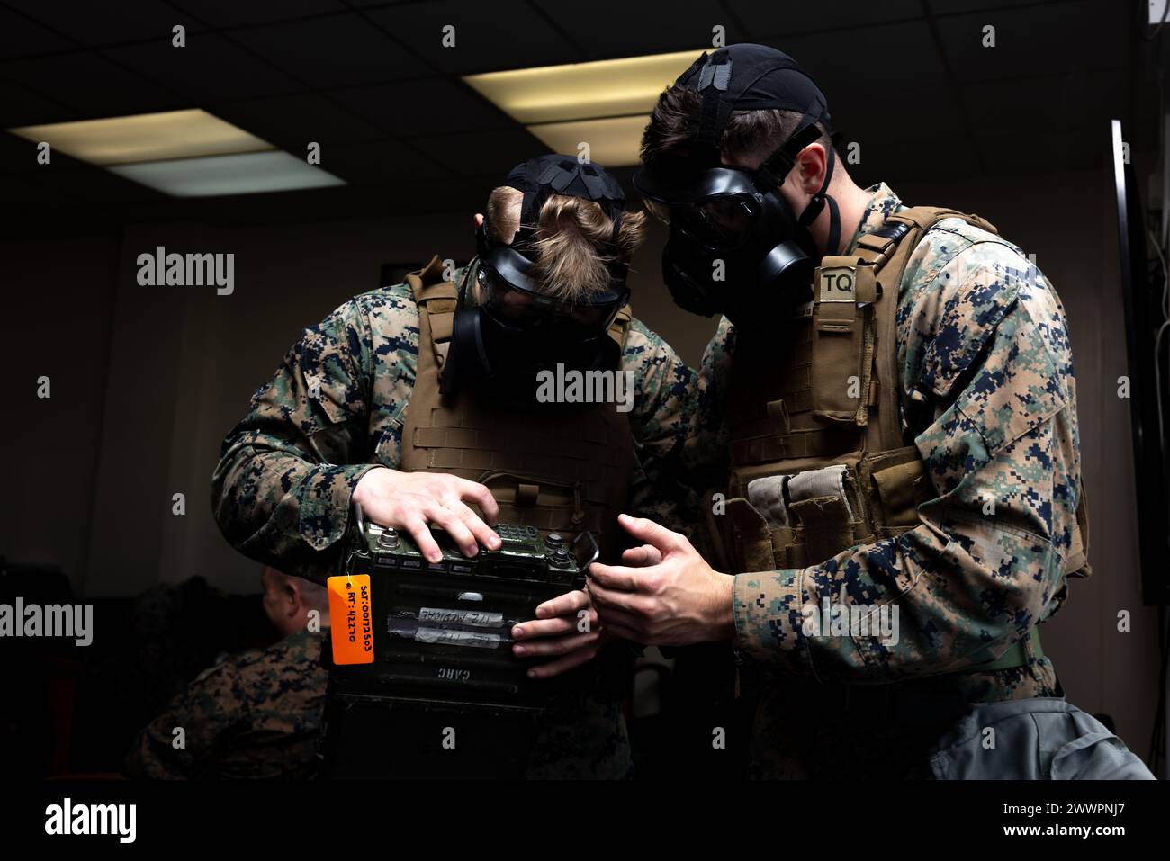 U.S. Marine Corps Lance Cpl. Alex Pearce, left, and Cpl. Theodore Smith ...