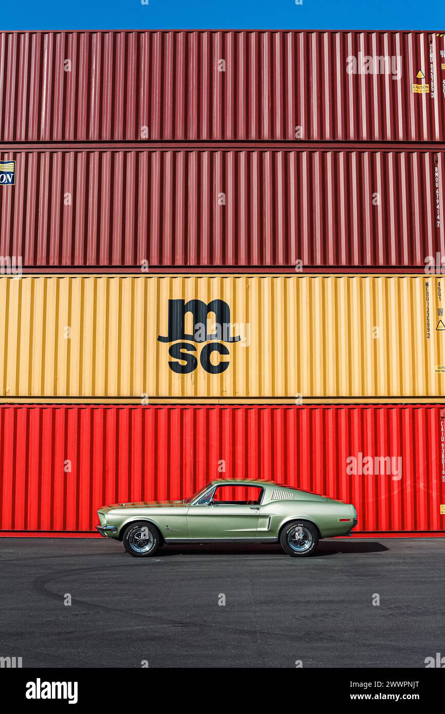 Car with shipping container in background Stock Photo - Alamy