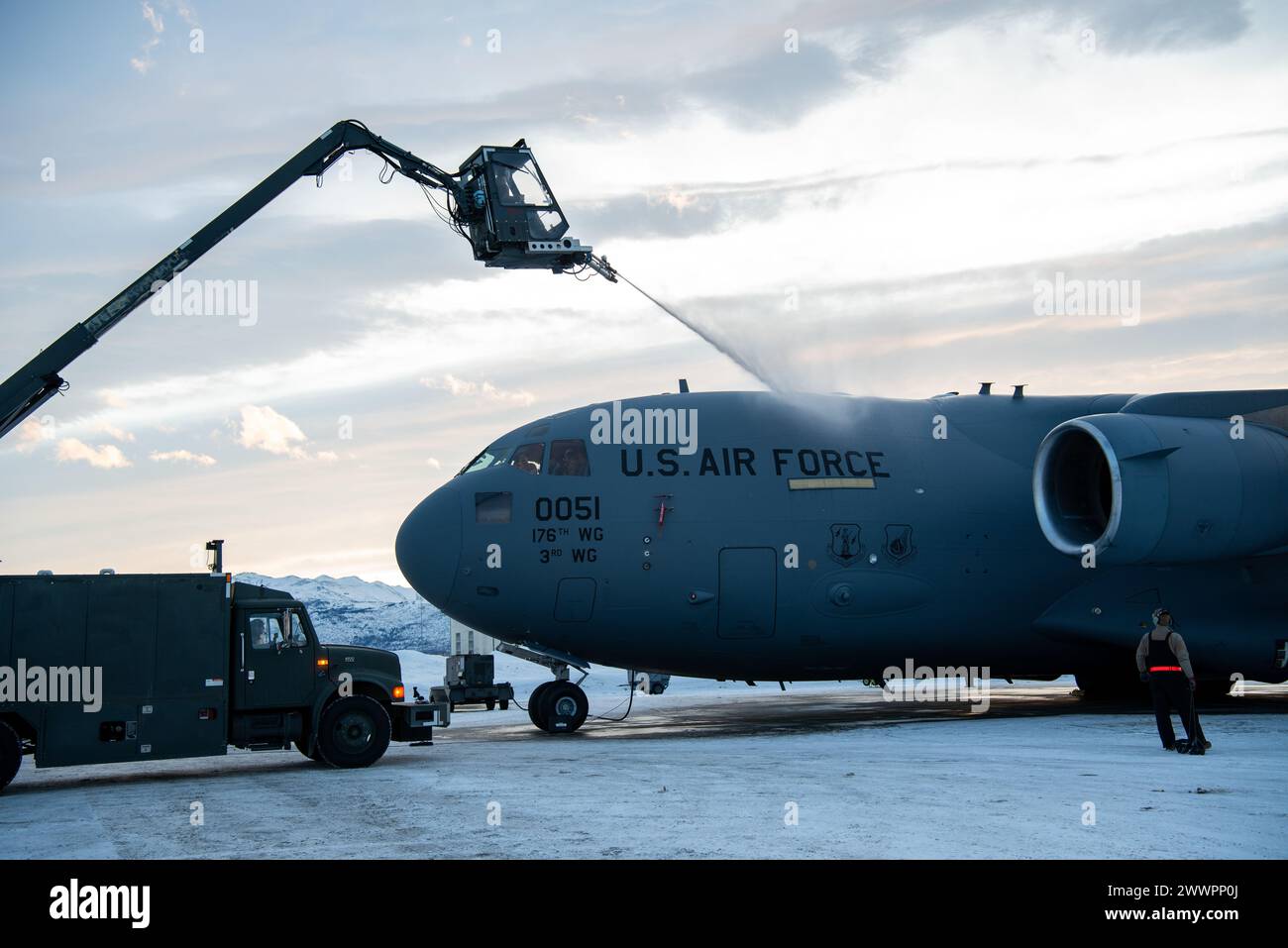 U.S. Air Force Senior Airman Owen Johnson, a crew chief assigned to the ...