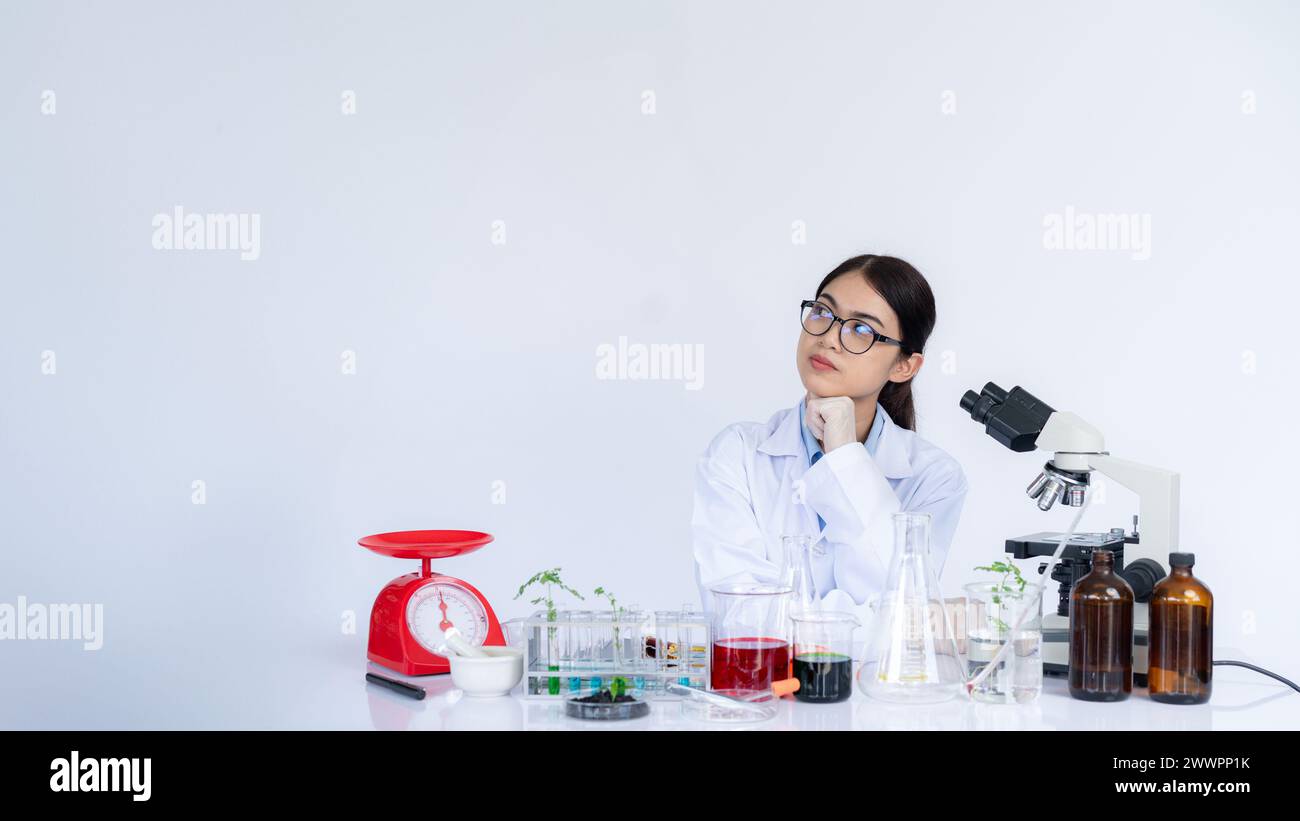 A female scientist demonstrating a pose while using her intellect Stock ...