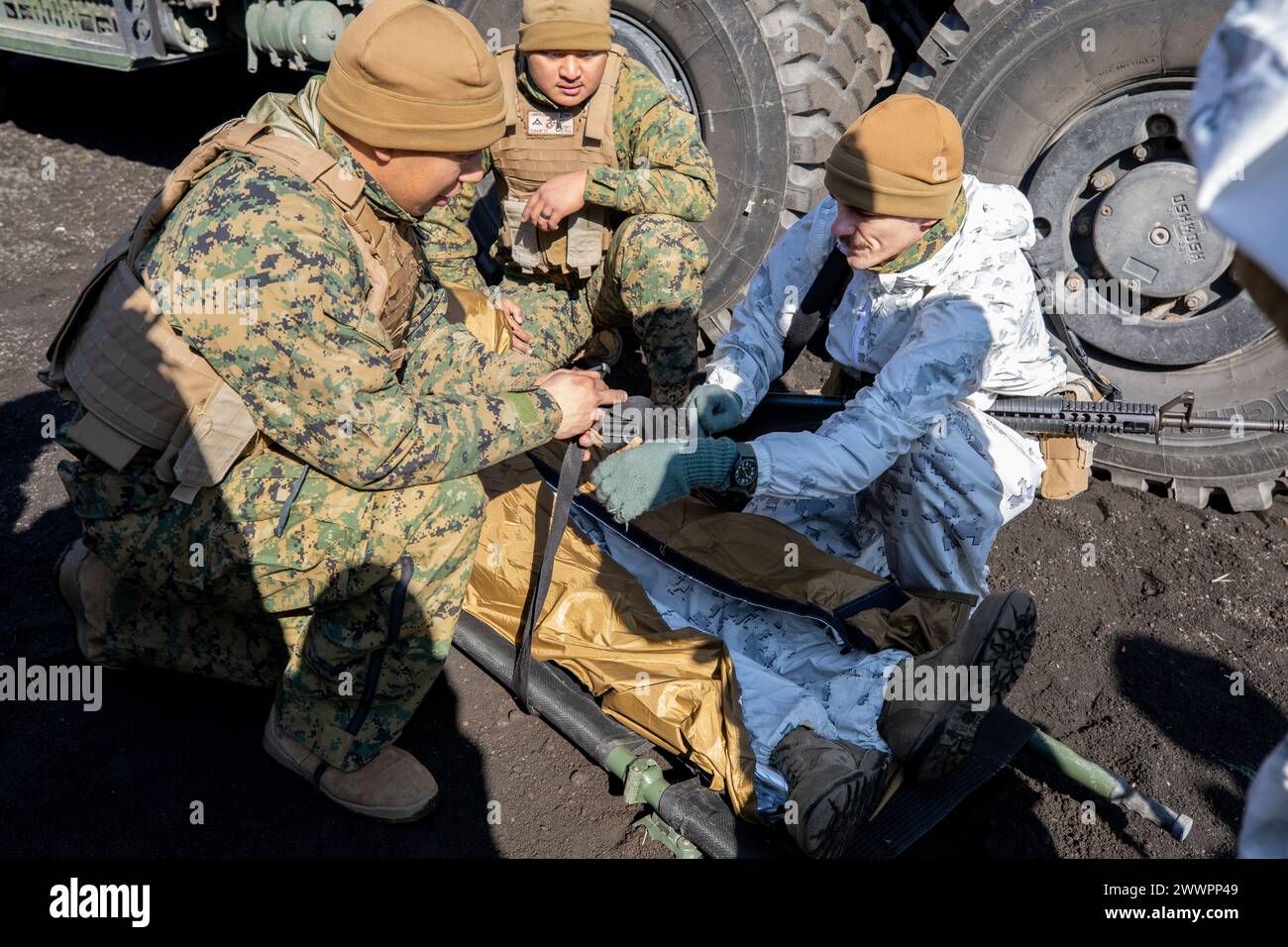U.S. Navy Hospital Corpsman 3rd Class Caleb Graves, right, with Combat ...