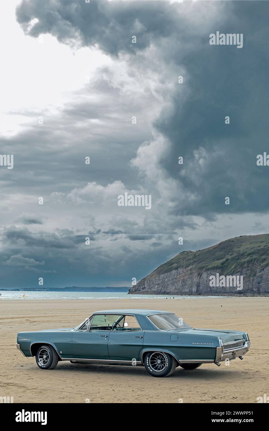 Classic car on a beach Stock Photo - Alamy