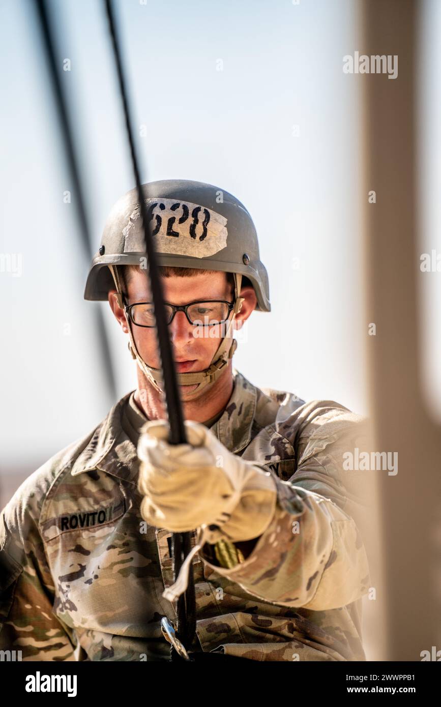 Air Assault candidates rappel off the rappel towers on Camp Buehring ...
