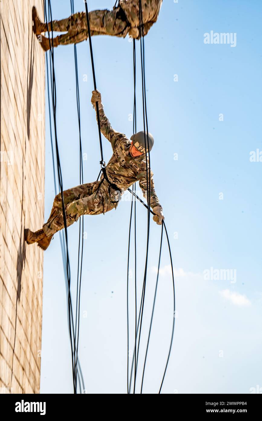Air Assault candidates rappel off the rappel towers on Camp Buehring ...