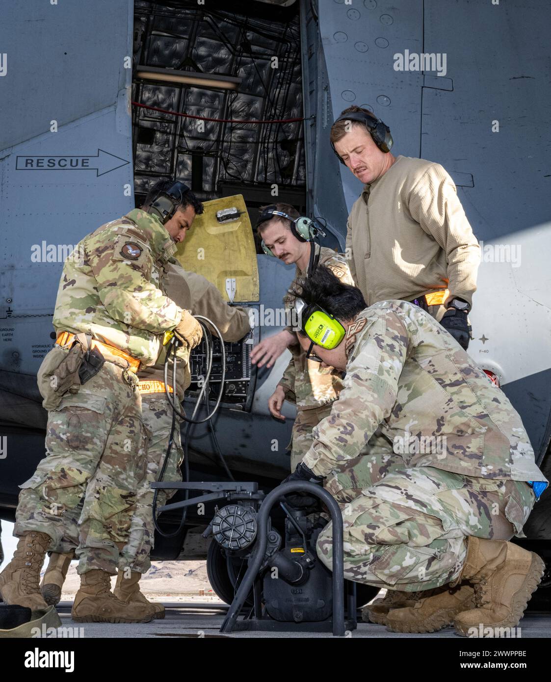 U.S. Air Force Airmen follow technical orders to execute an aircraft-to ...