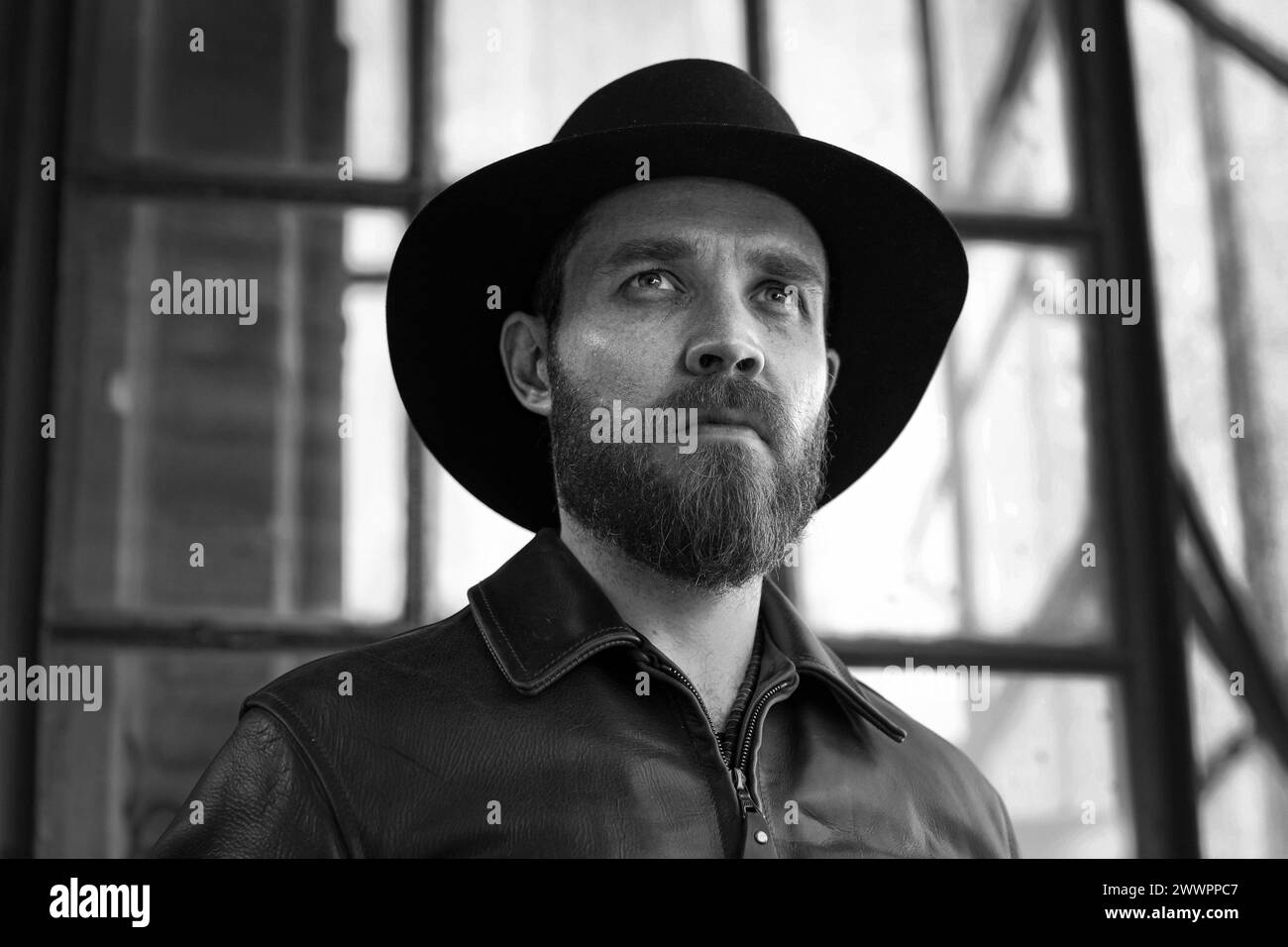 Stylish man with beard wearing fedora hat . Bearded man wearing black ...