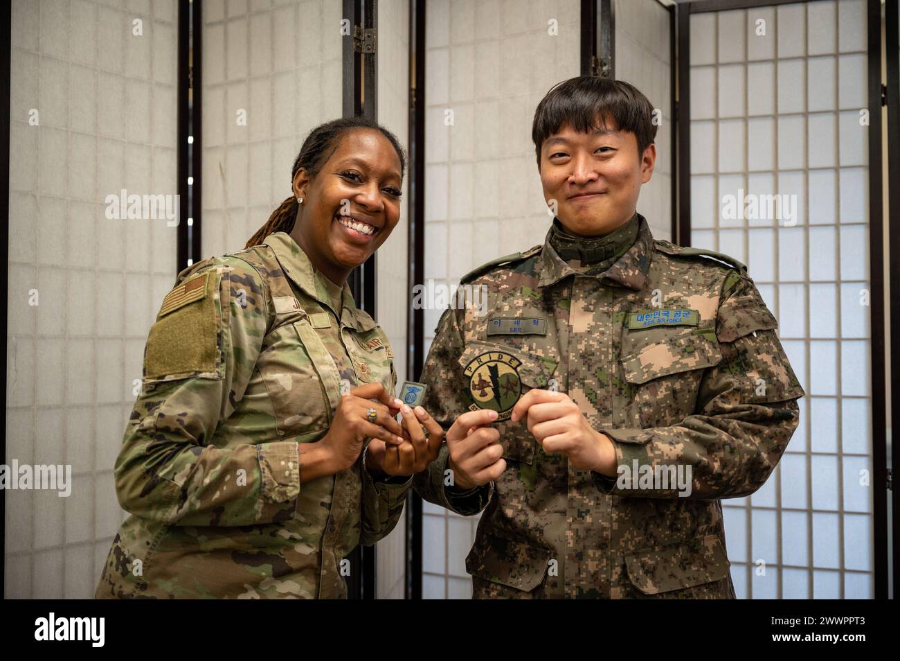 U.S. Air Force Staff Sgt. Bria Jackson, left, 51st Civil Engineer ...