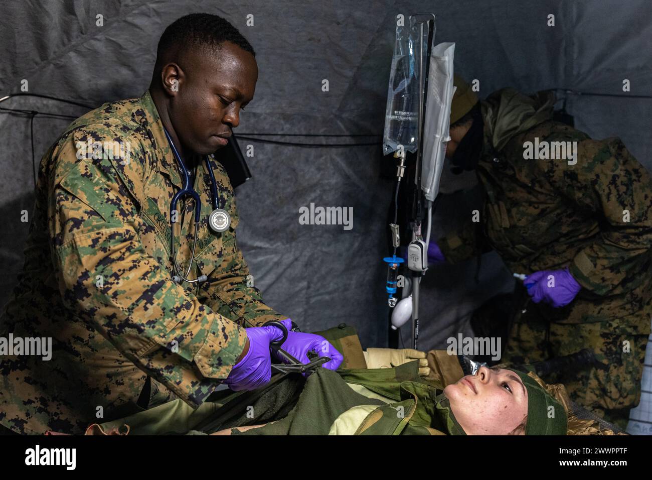 U.S. Navy Hospital Corpsman 3rd Class Michael Okello with Combat ...