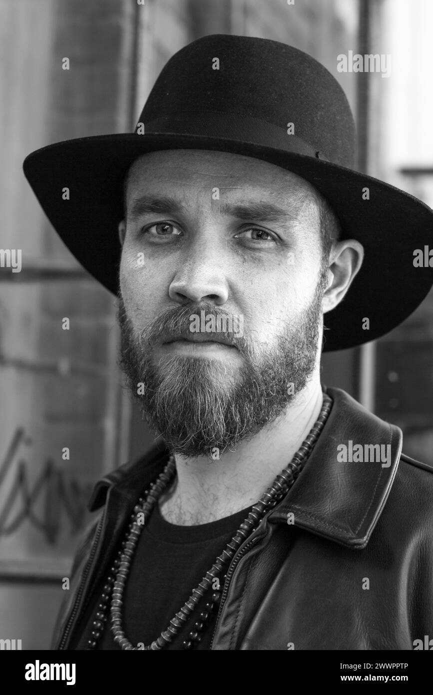 Stylish man with beard wearing fedora hat . Bearded man wearing black ...