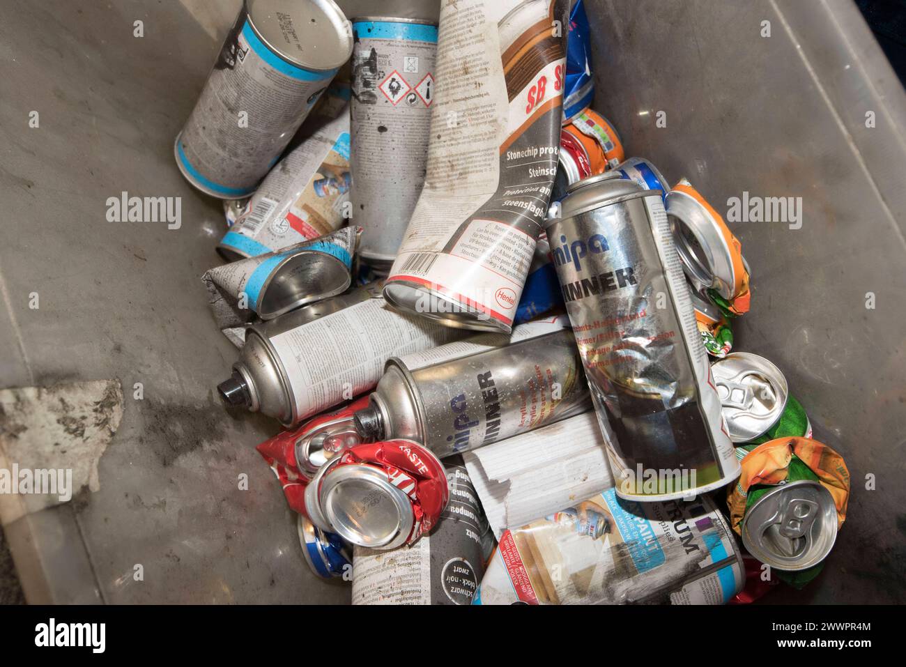 spraying color with an aerosol can or a spray can spraying color with ...