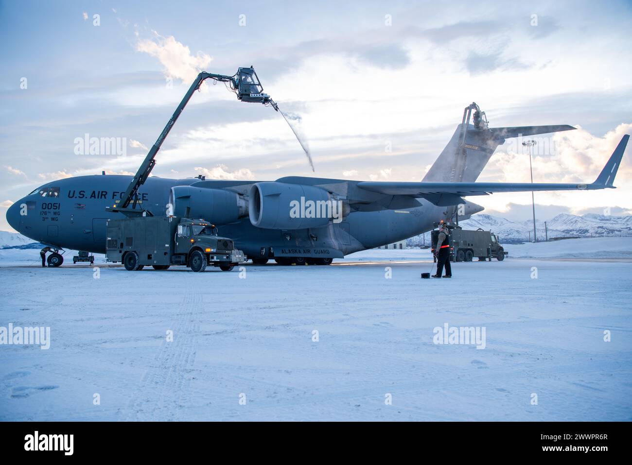 U.S. Air Force Senior Airman Owen Johnson, a crew chief assigned to the ...