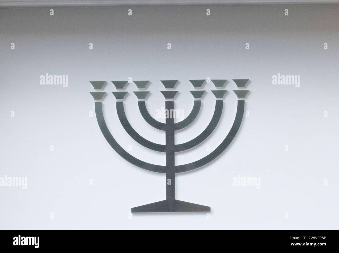 a hanukkah menorah or a hanukkiah, a nine branched candelabrum hanukkah ...