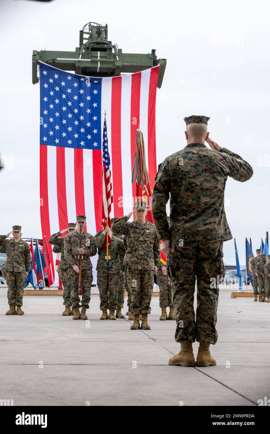 U.S. Marines with Marine Heavy Helicopter Squadron (HMH) 464 standing ...