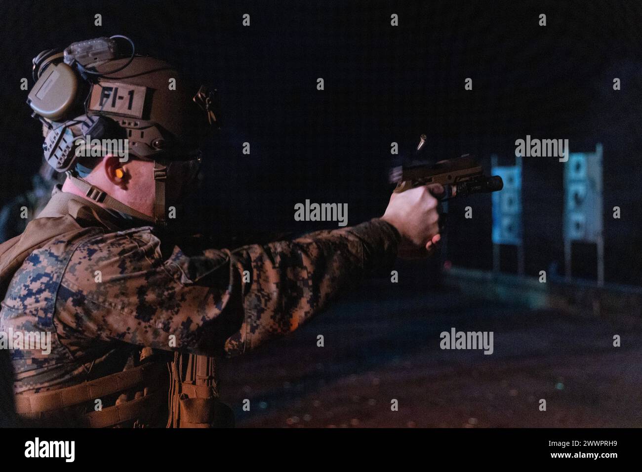 U.S. Marine Corps Lance Cpl. Robert Price, an armorer with the command ...