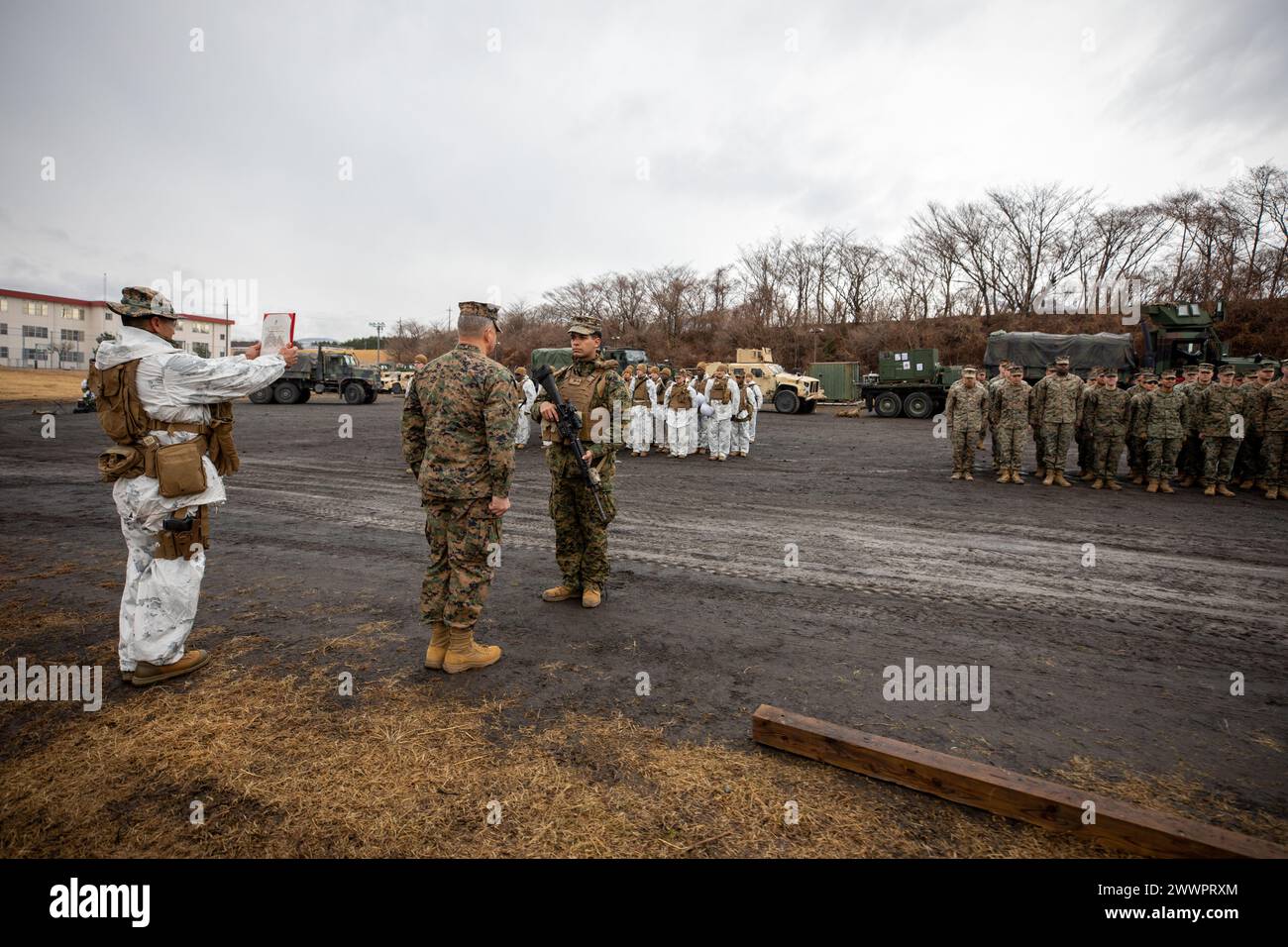 U.S. Marine Corps Lance Cpl. Omar Mendez Dorta, center, a motor vehicle ...
