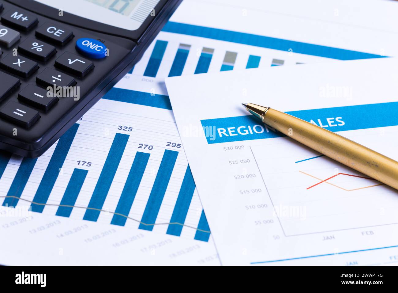 Graphs and Calculator Stock Photo - Alamy