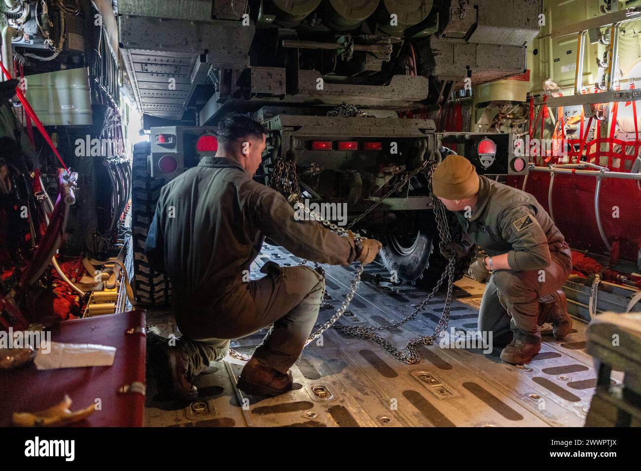 U.S. Marine Corps Staff Sgt. Lance Orticke (left) and Sgt. Joshua ...