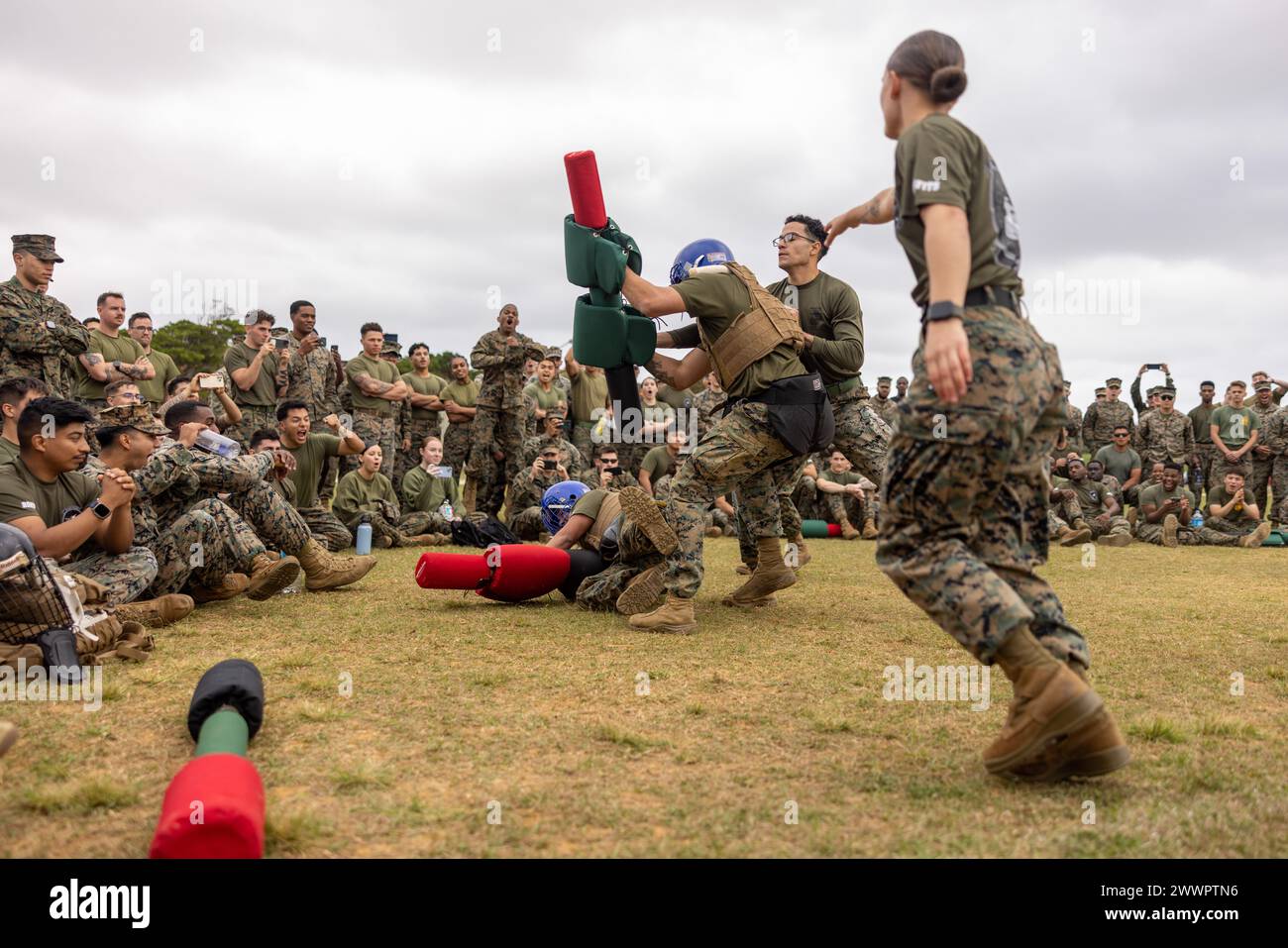 U.S. Marines with Marine Air Control Group (MACG) 18, participate in pugil stick match during a ...