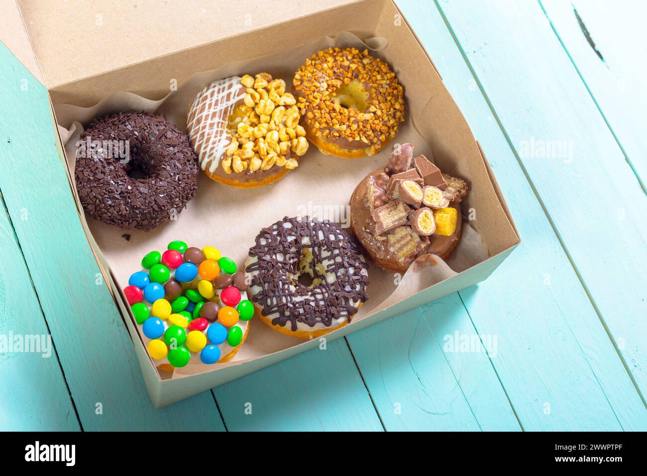 Colorful donuts in box Stock Photo - Alamy