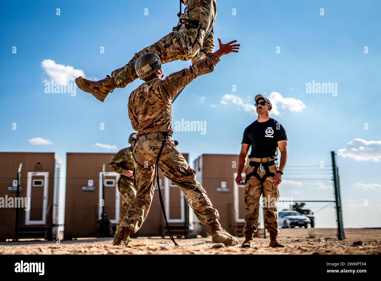 Air Assault candidates rappel off the rappel towers on Camp Buehring ...