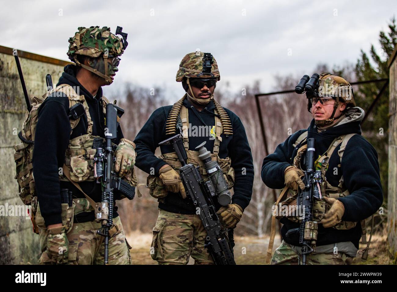 From left, U.S. Army Pfc. Gabriel Delvalle, Pvt. Kendrick Harper, and ...