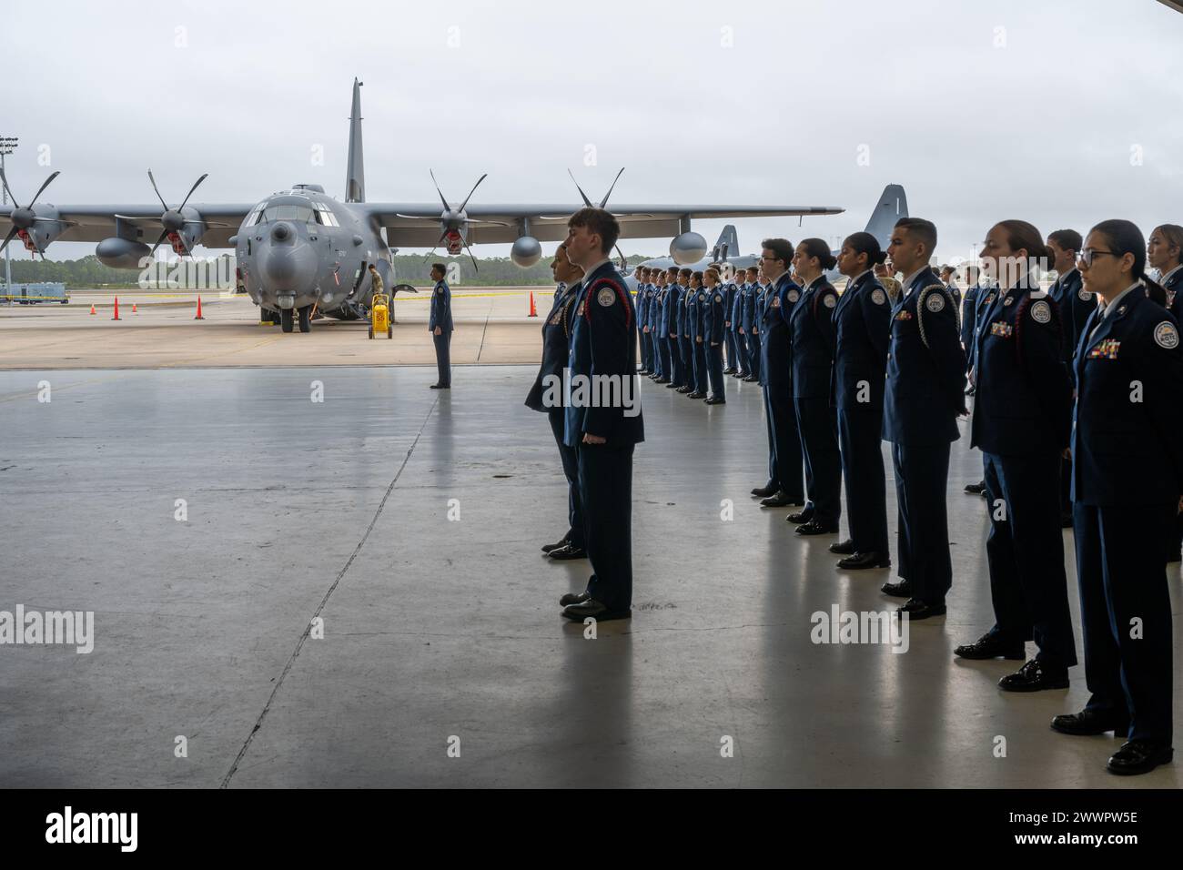 Air Force Junior ROTC cadets stand at the position of attention during ...