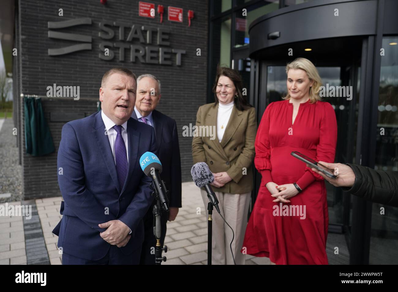 (left to right) Finance minister Michael McGrath, chairman and chief ...