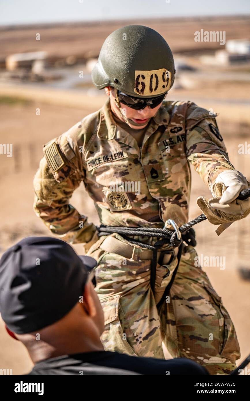 Air Assault candidates rappel off the rappel towers on Camp Buehring ...