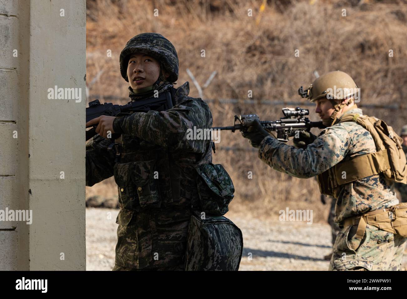 U.S. Marine Corps Lance Cpl. Nathan Keith and a Republic of Korea ...