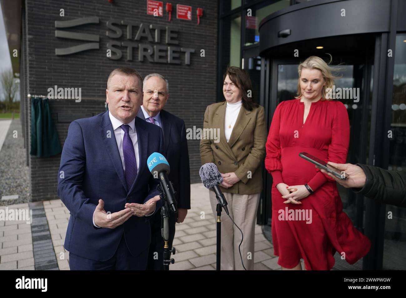 (left to right) Finance minister Michael McGrath, chairman and chief ...