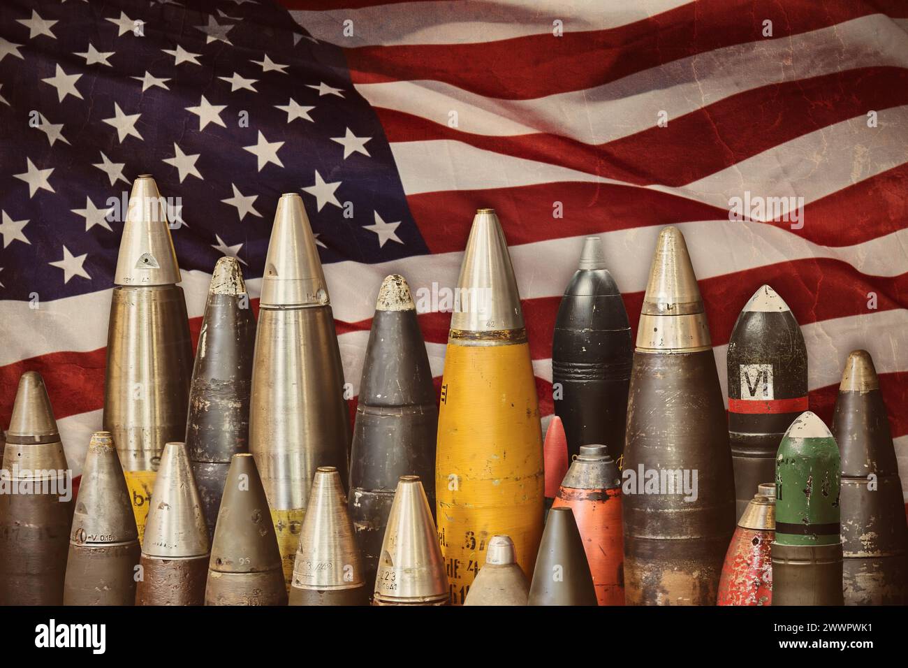 Military bombs and ammunition in front of a waving American flag Stock ...