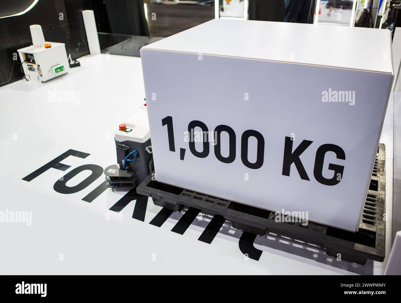 Automated guided vehicle carry box. AI forklift robot in modern ...