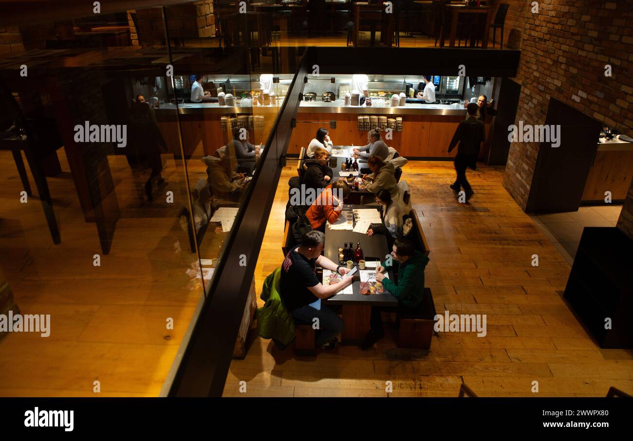 People eating at tables at Wagamama restaurant on Goodramgate in York ...