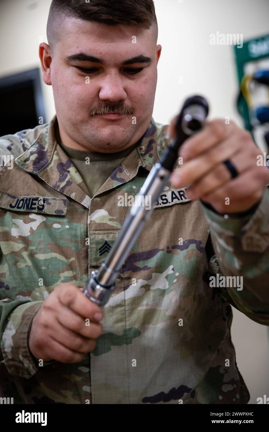 Oklahoma Army National Guardsman Sgt. Daniel Jones, a wheeled vehicle ...