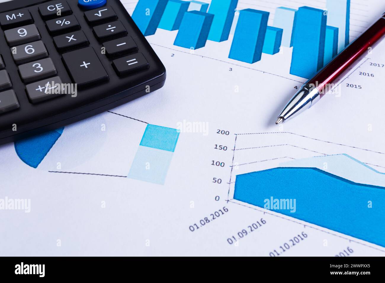 Graphs and Calculator Stock Photo - Alamy