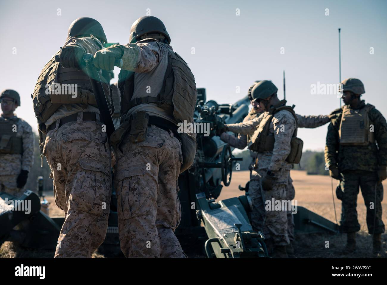 U.S. Marines with The Basic School demonstrate how to operate an M777 ...