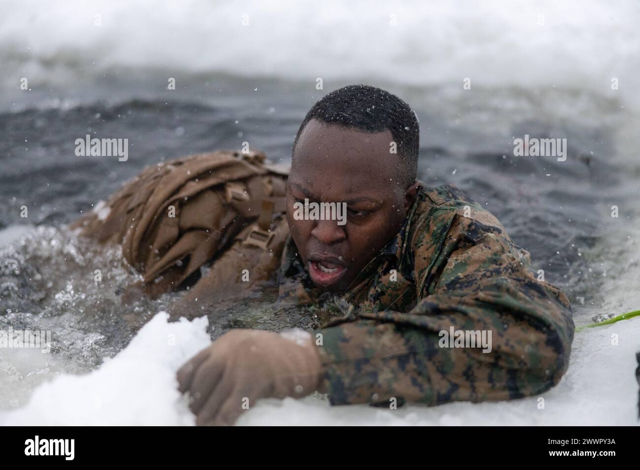 U.S. Navy Hospital Corpsman 3rd Class Michael Okello, assigned to ...